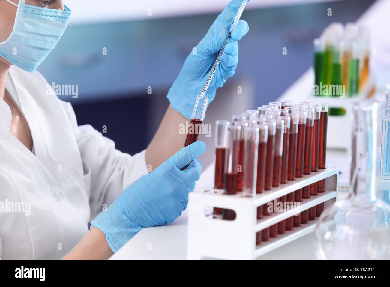 Scientist working with blood hi-res stock photography and images - Alamy