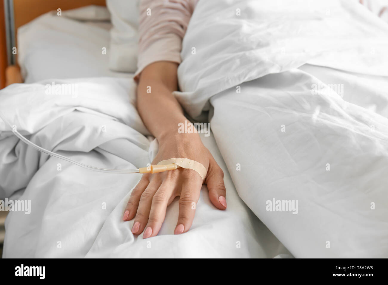 Female patient with infusion drip in hospital Stock Photo - Alamy