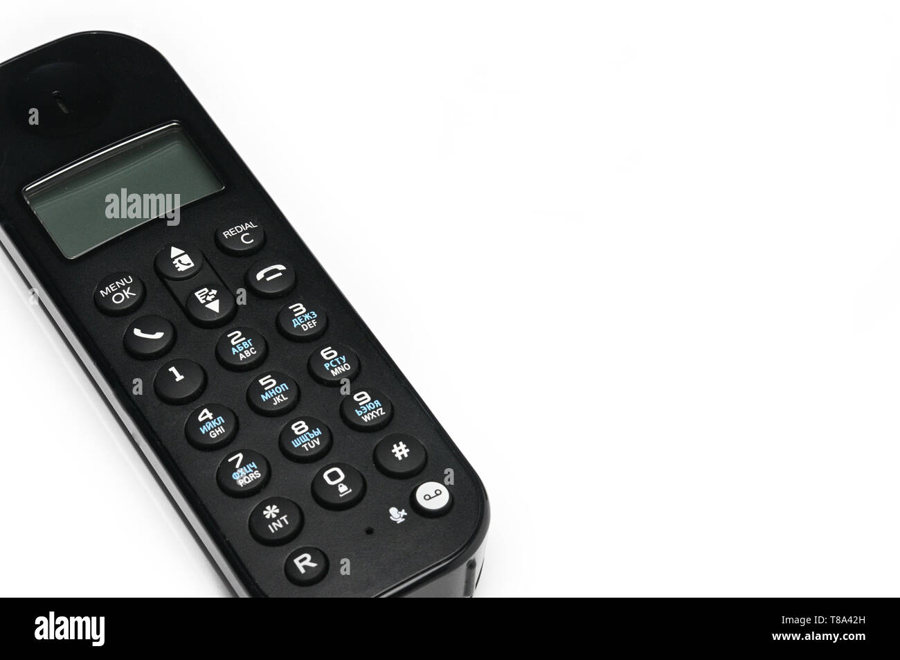 Telephone handset for calls to urban and long-distance lines on a white ...