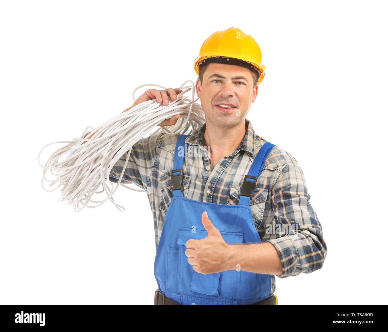 Electrician showing thumb-up gesture on white background Stock Photo ...