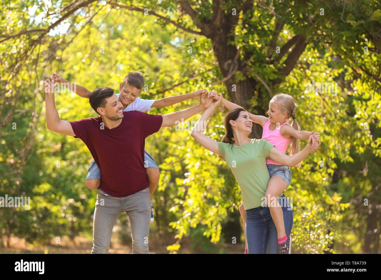 Family having fun in park hi-res stock photography and images - Alamy