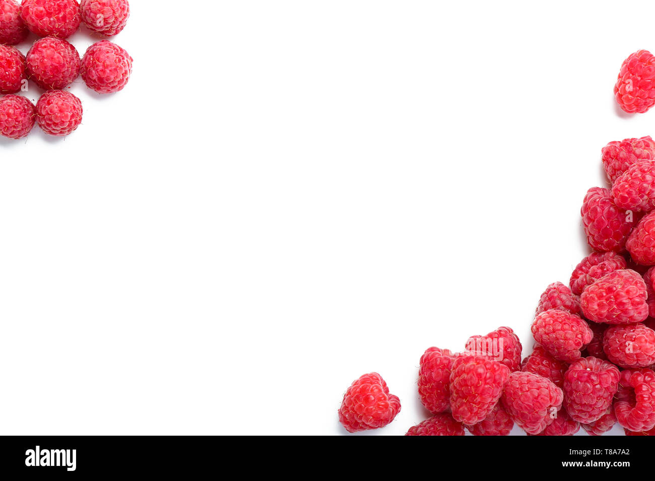 Delicious ripe raspberries on white background Stock Photo - Alamy