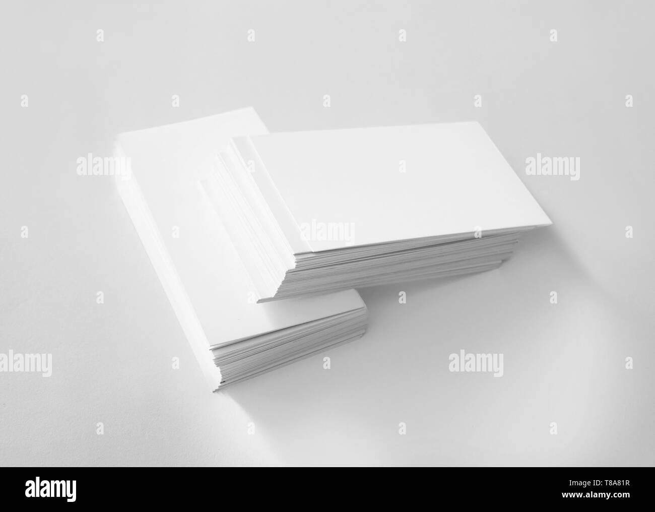 Blank business cards on white background Stock Photo - Alamy