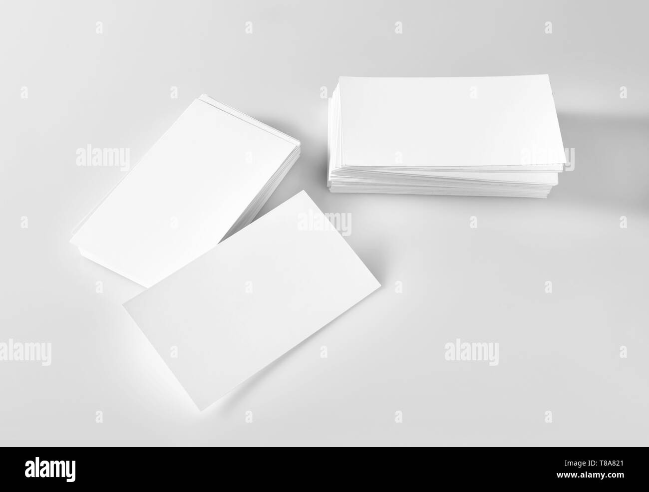 Blank business cards on white background Stock Photo - Alamy