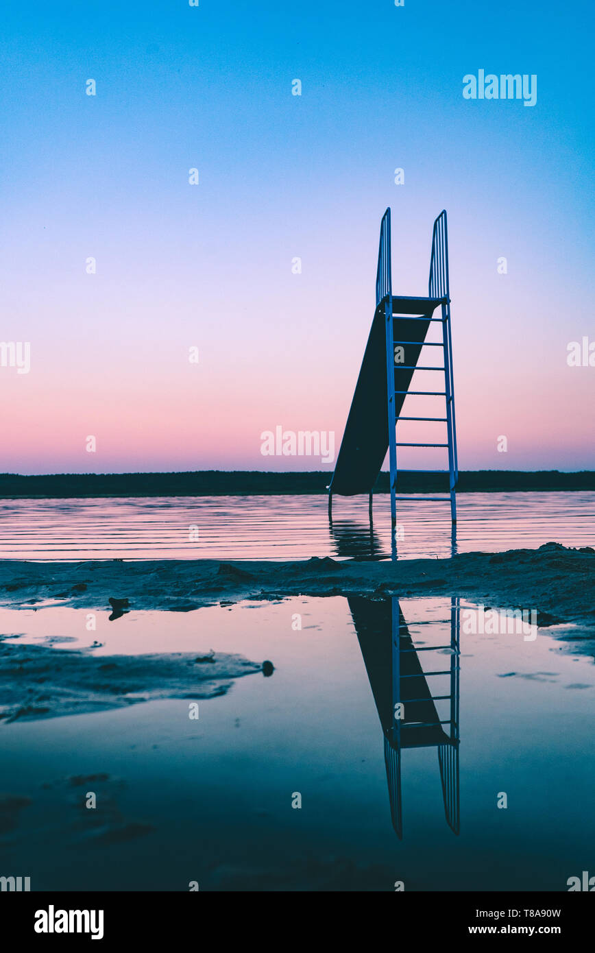 Empty playground slide hi-res stock photography and images - Alamy