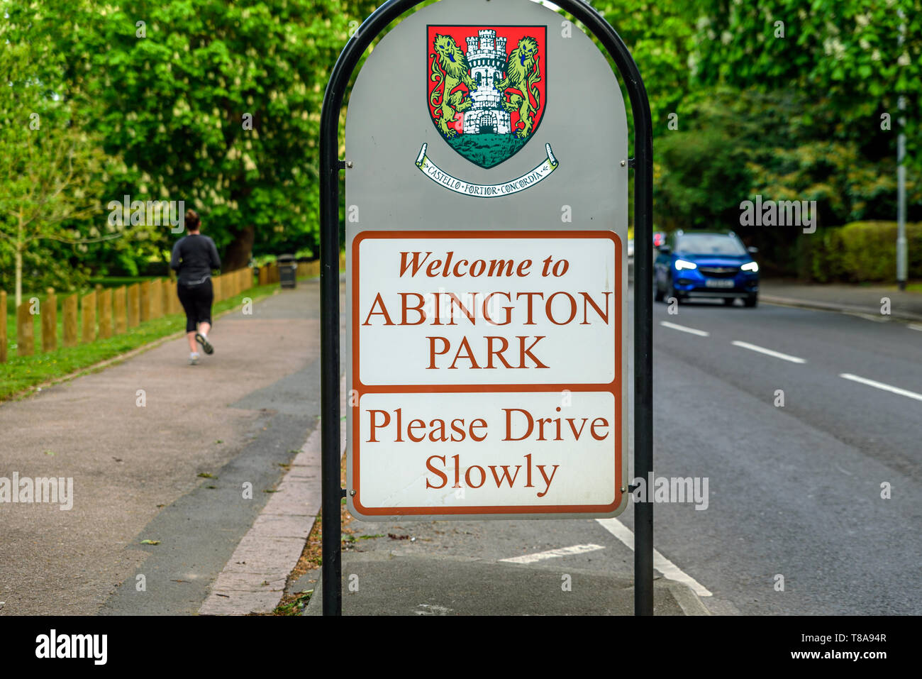 abington park entrance sign between footpath and road in northampton ...
