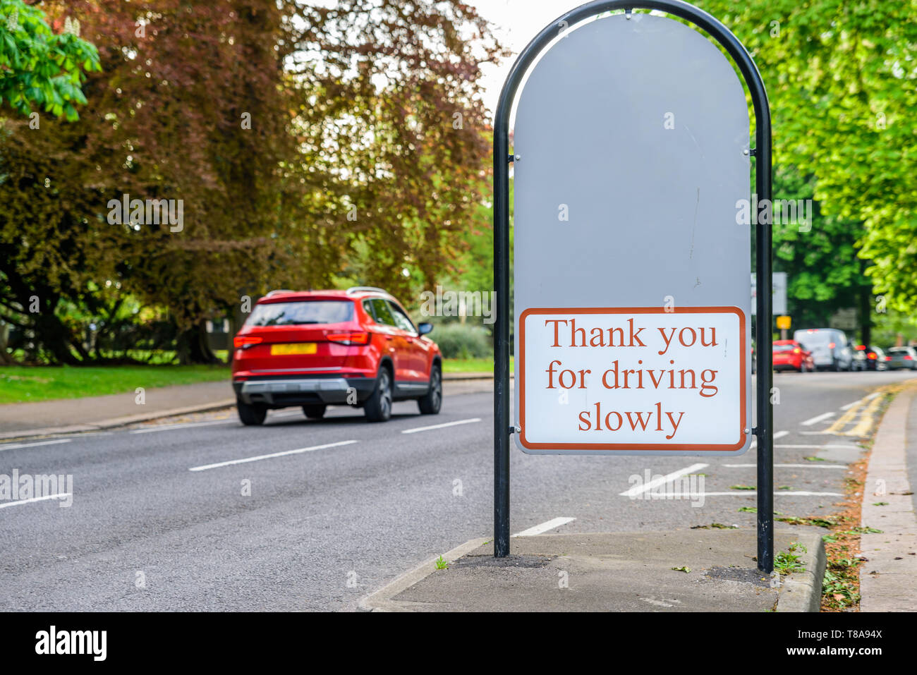 abington park entrance sign between footpath and road in northampton ...