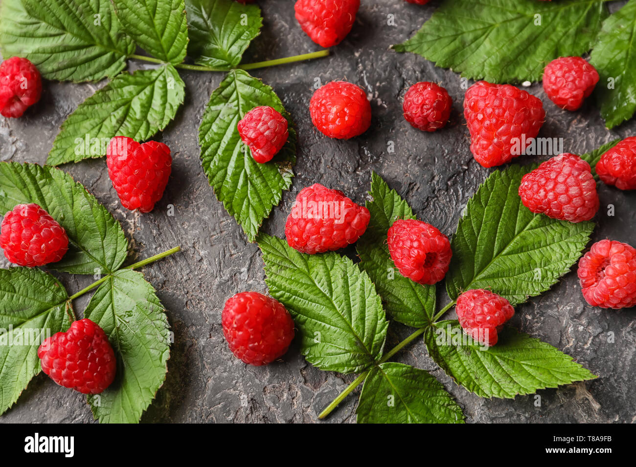 Ripe aromatic raspberries green hi-res stock photography and images - Alamy