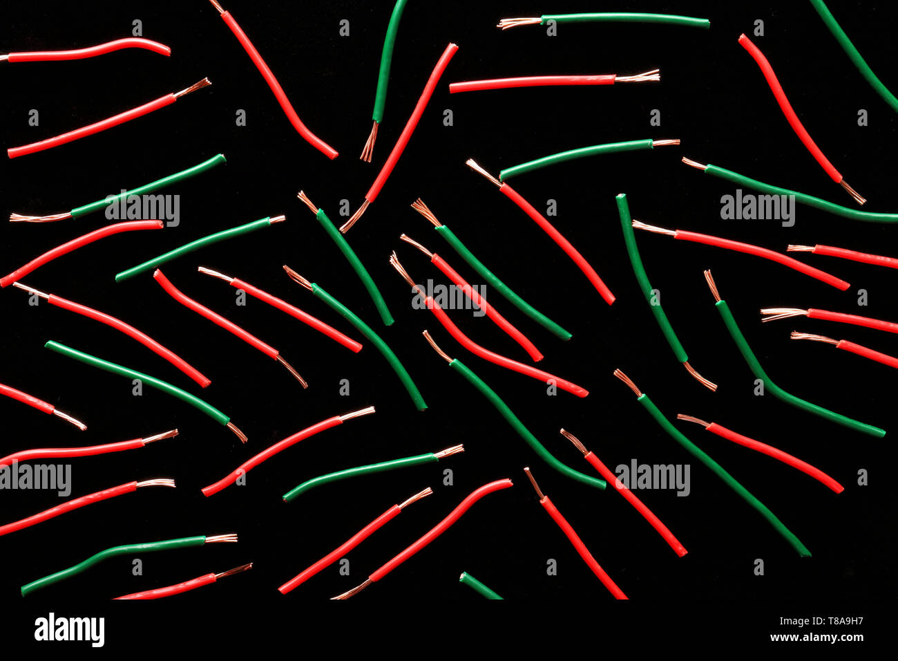 Different wires on dark background Stock Photo - Alamy