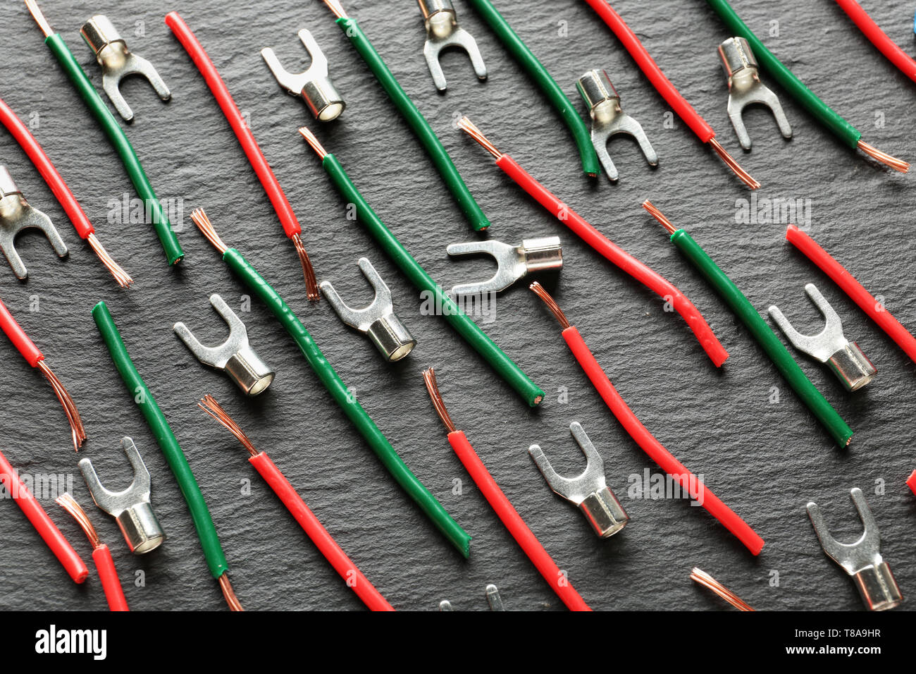 Different terminal ends with wires on dark table Stock Photo - Alamy