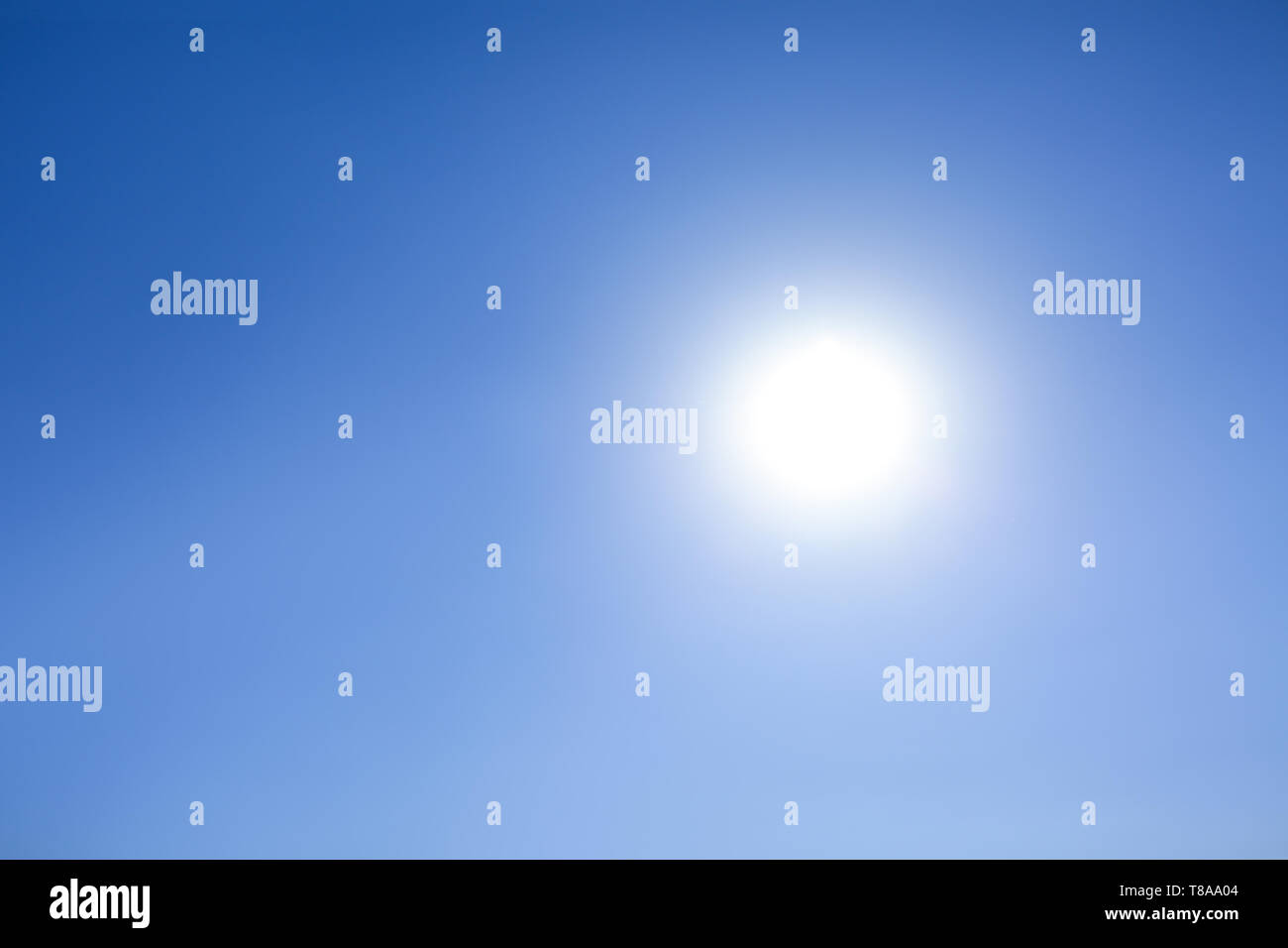 Beautiful view of blue sky with sun Stock Photo - Alamy