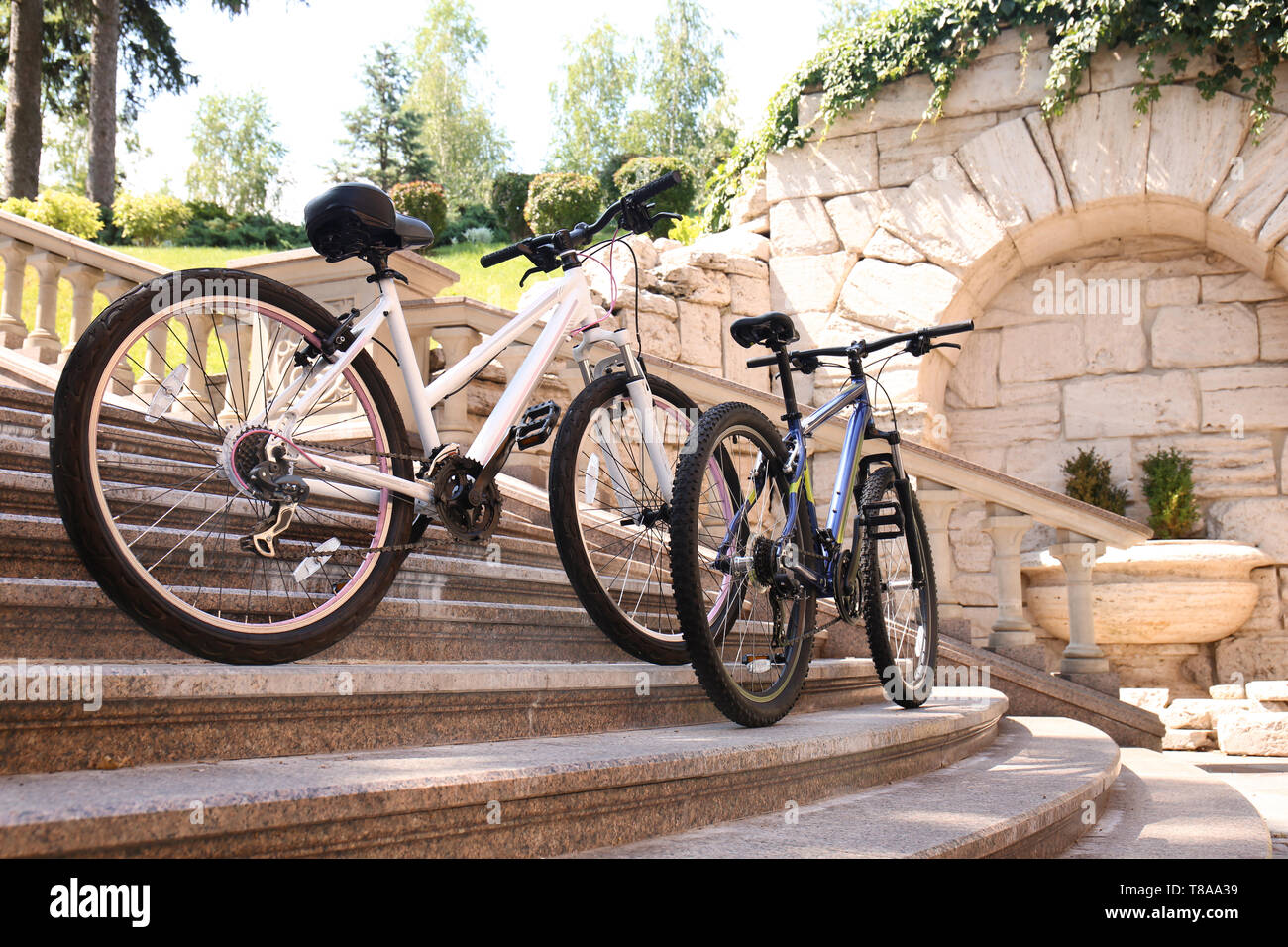 Modern bicycles on stairs outdoors Stock Photo - Alamy