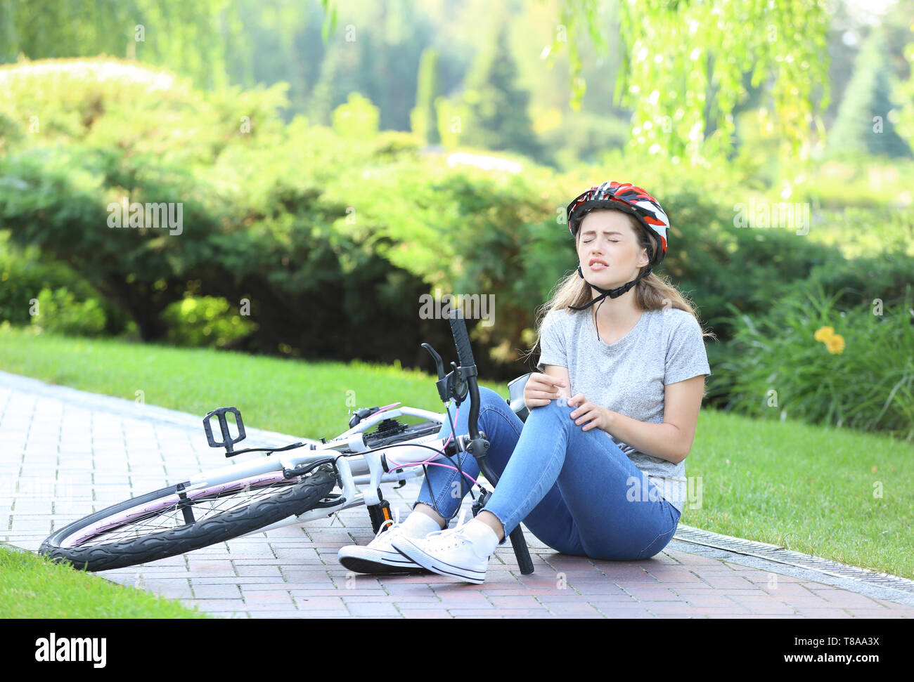 Female bicycle fallen hi-res stock photography and images - Alamy