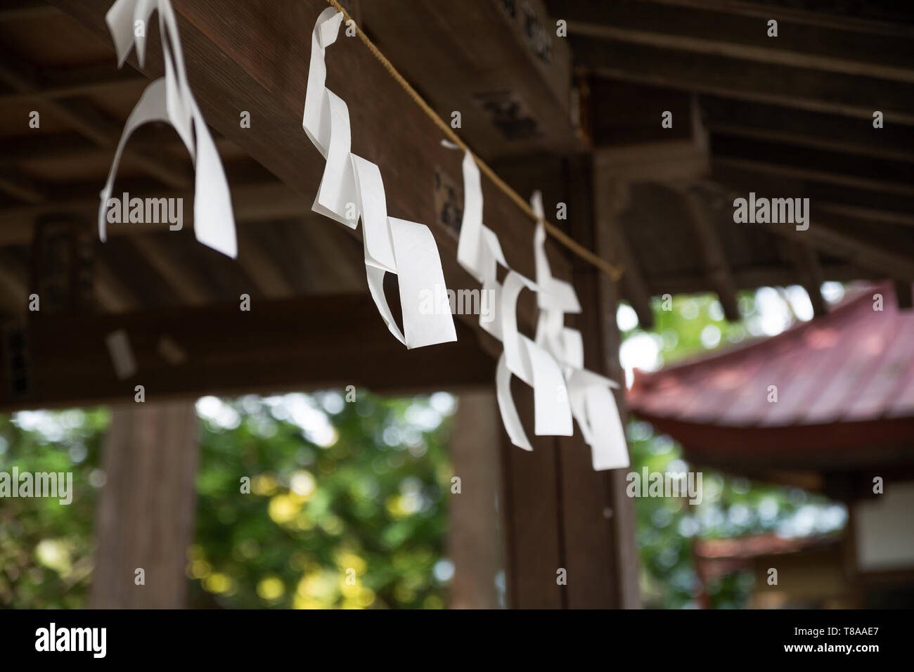 prayer papers in japanese shrine Stock Photo - Alamy