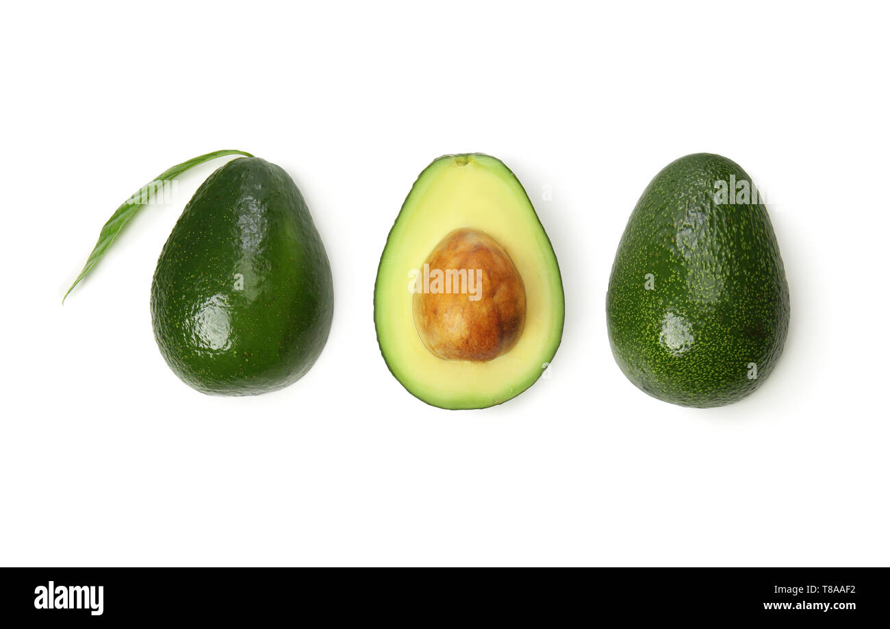 Fresh ripe avocados on white background Stock Photo - Alamy