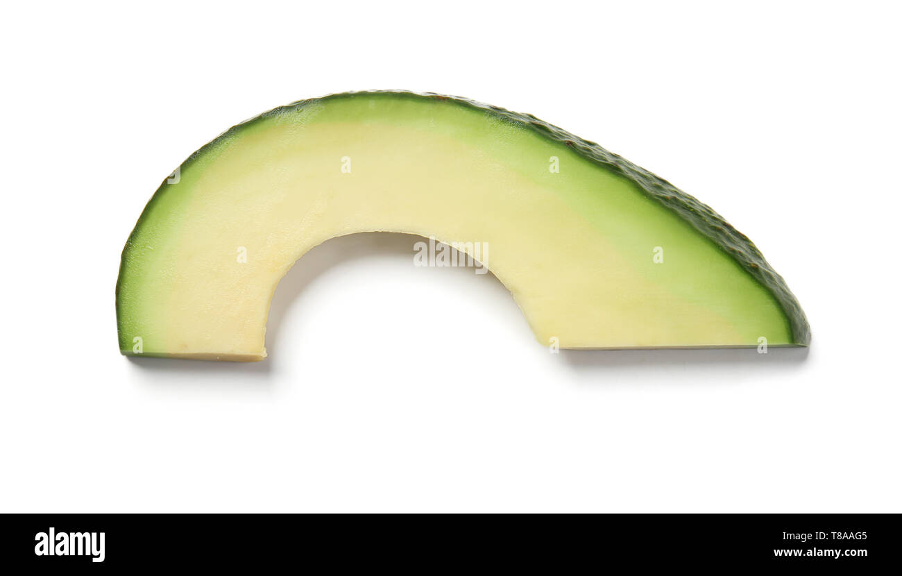 Slice of ripe avocado on white background Stock Photo - Alamy