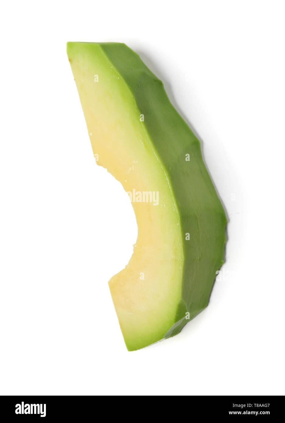Slice of peeled avocado on white background Stock Photo - Alamy