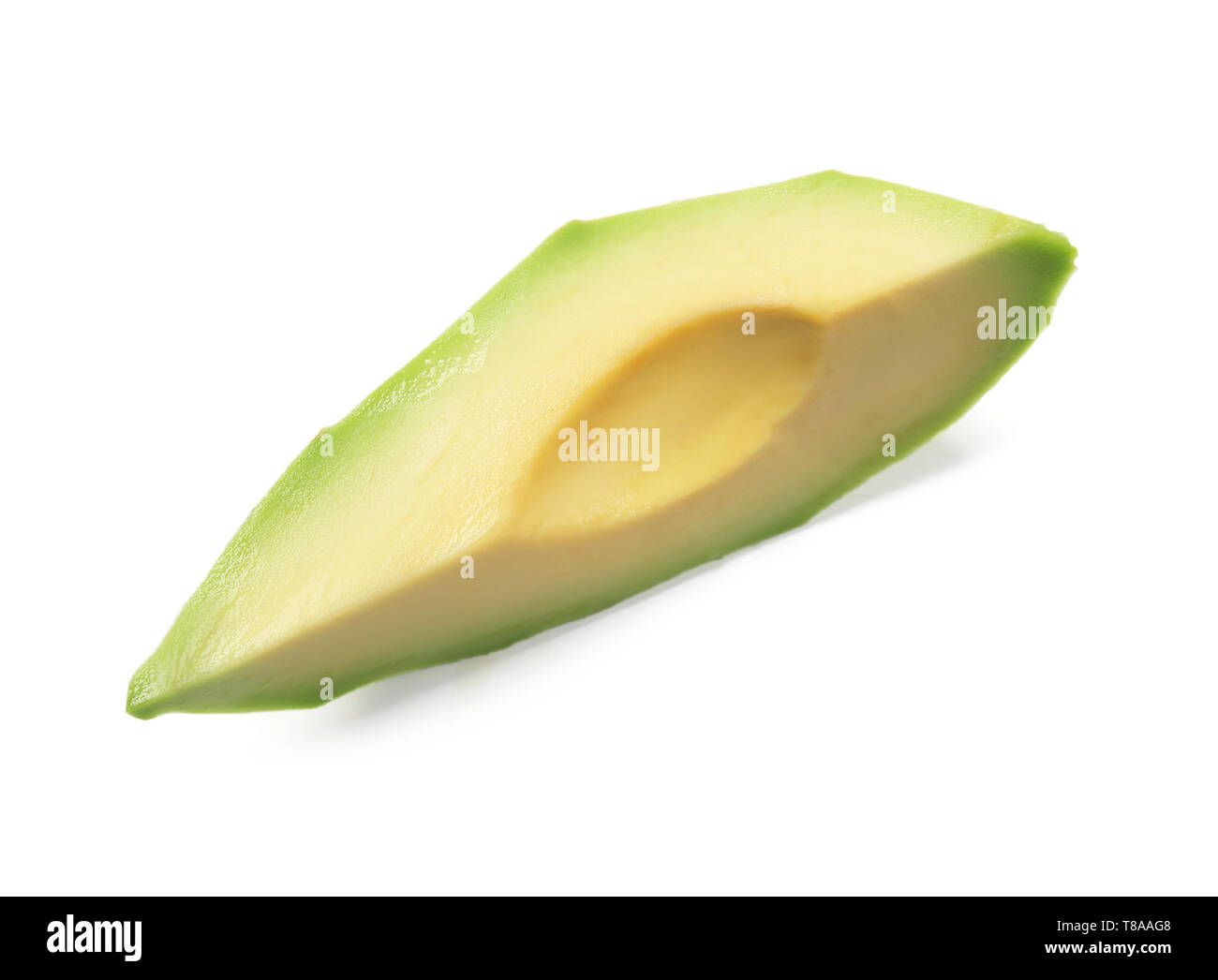 Slice of peeled avocado on white background Stock Photo - Alamy