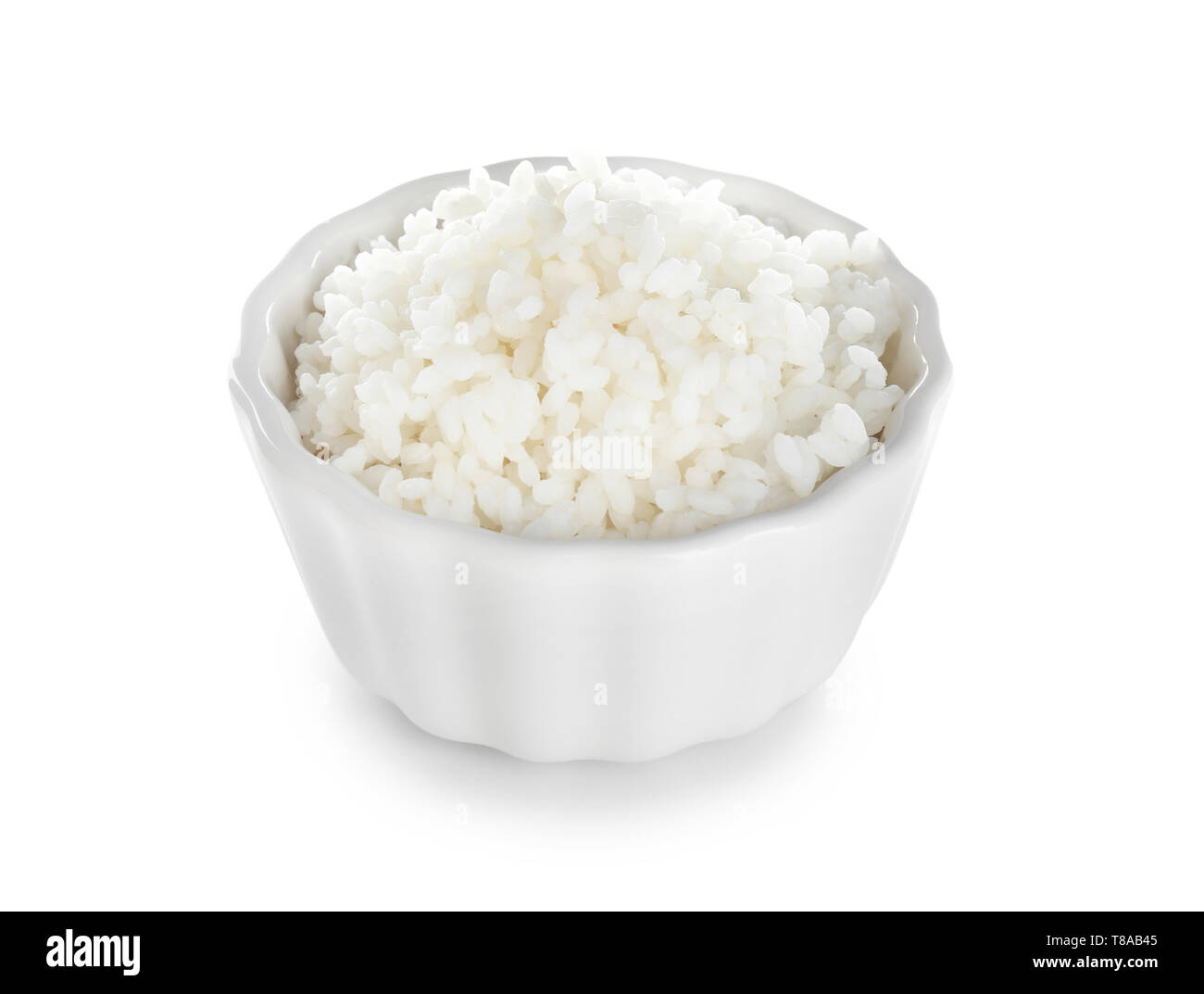 Bowl with freshly cooked rice on white background Stock Photo - Alamy