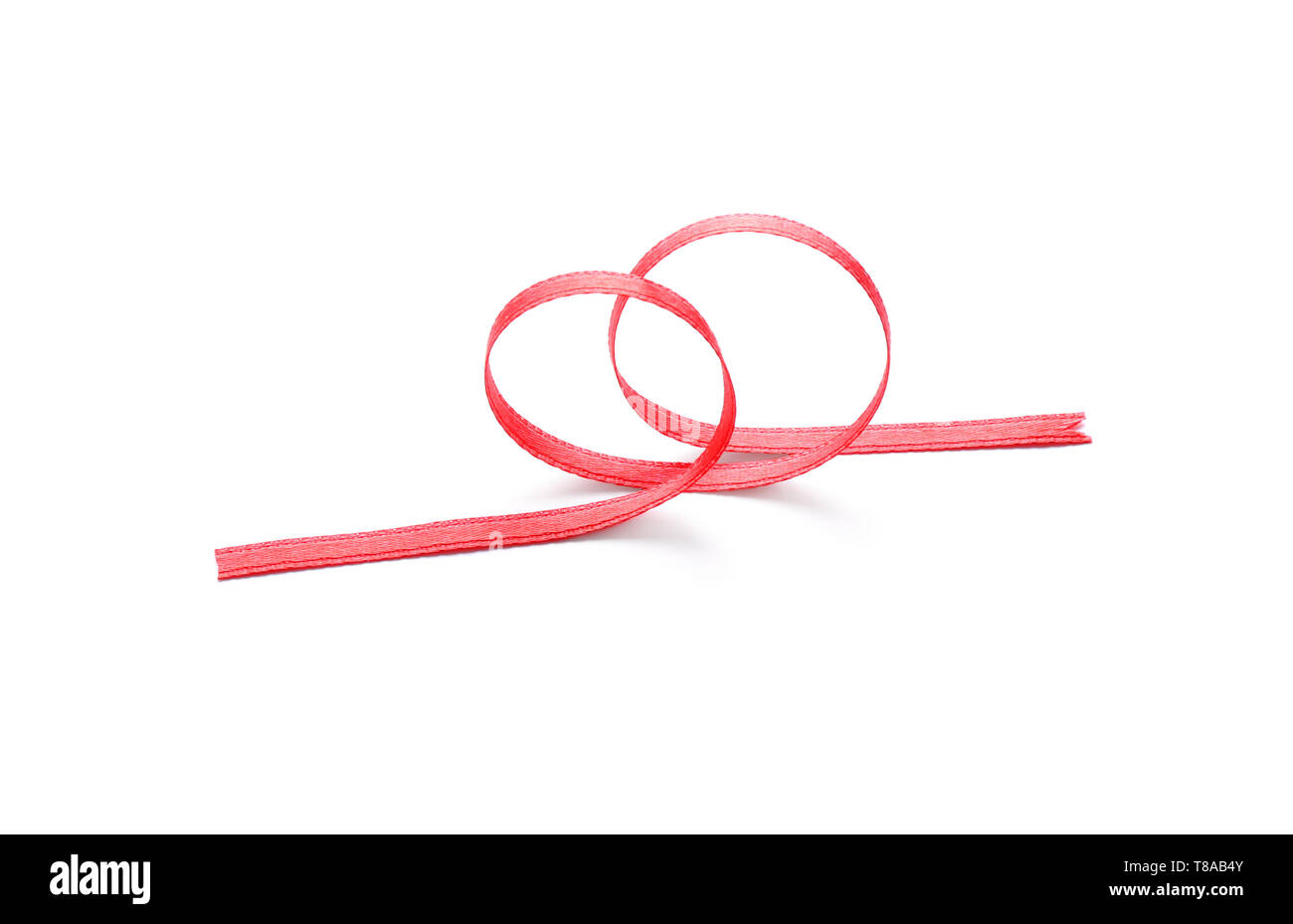 Simple red ribbon on white background Stock Photo - Alamy