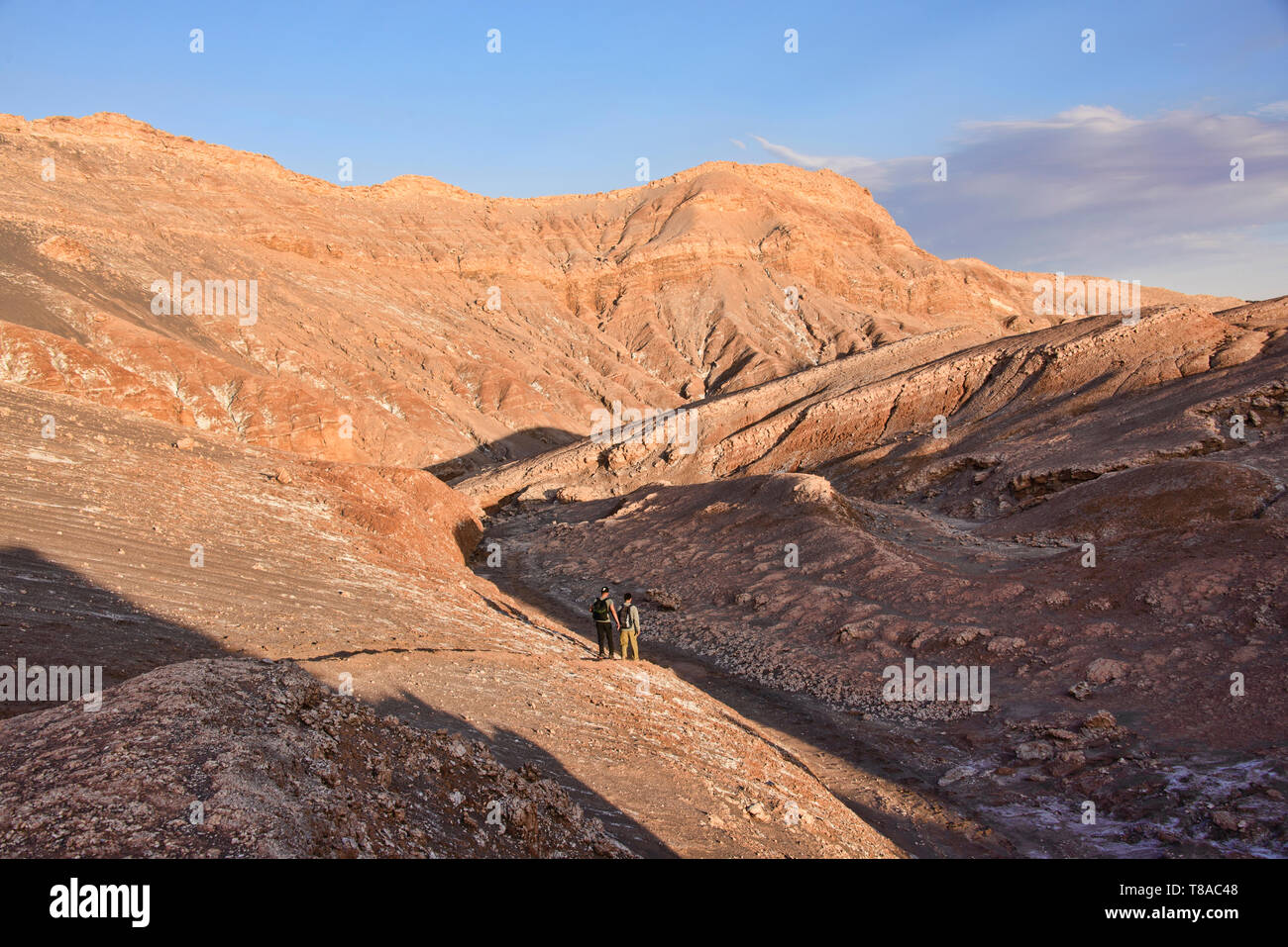 Tourist enjoying the salt, sand, and desertscape in the Moon Valley ...