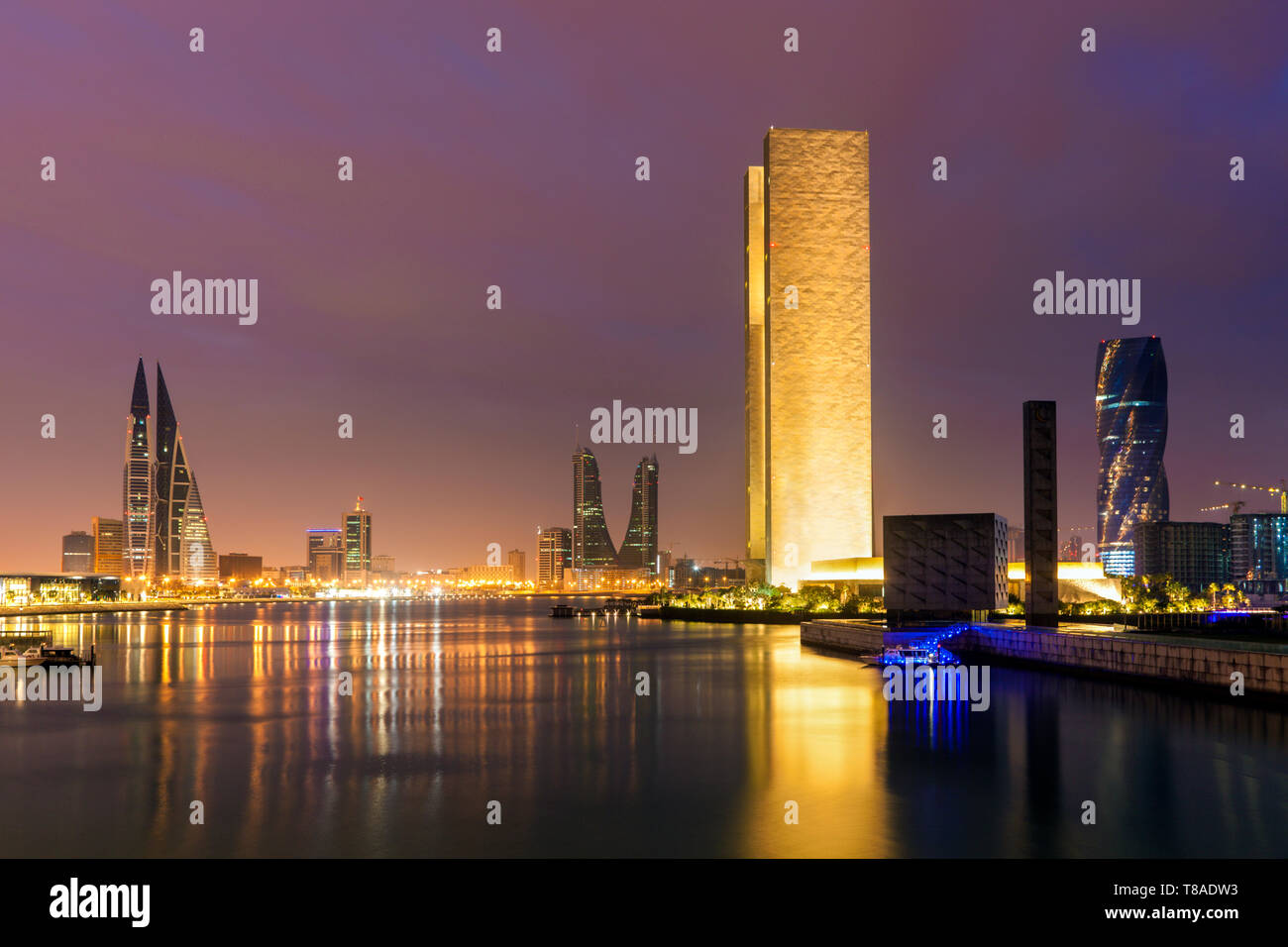 Mosque and modern skyline of Manama at night. Manama, Bahrain Stock ...