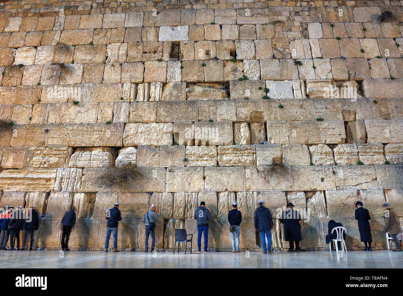 Praying at the Western 'Wailing' Wall of Ancient Temple in Jerusalem ...