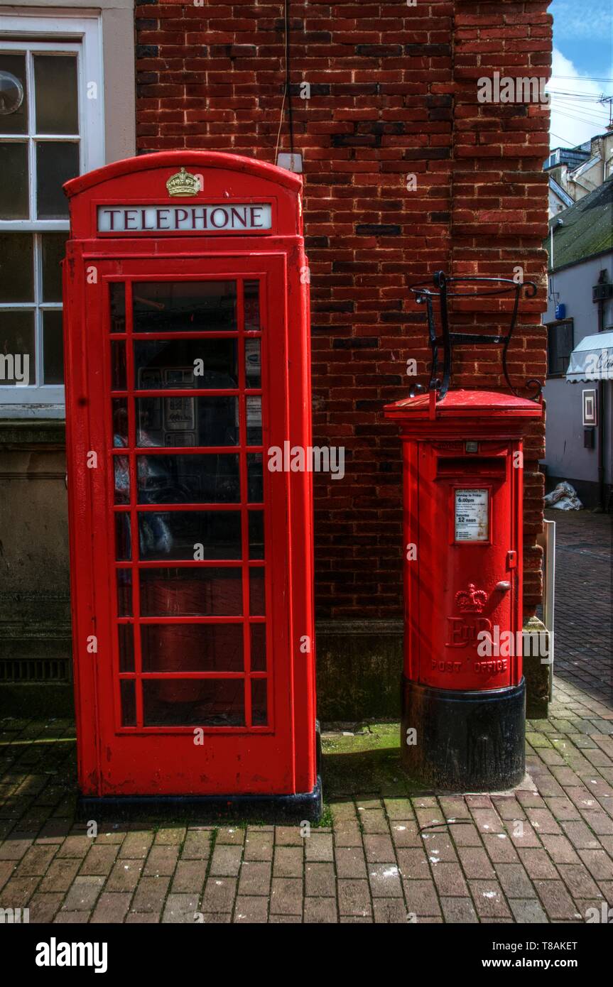British red postbox and telephone box seen in Sidmouth, Devon Stock ...