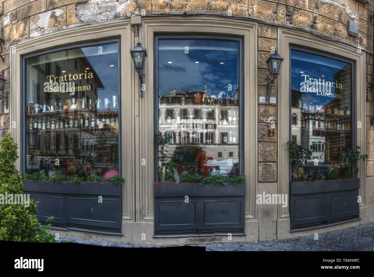 Reflections in a shop window in Florence Stock Photo - Alamy