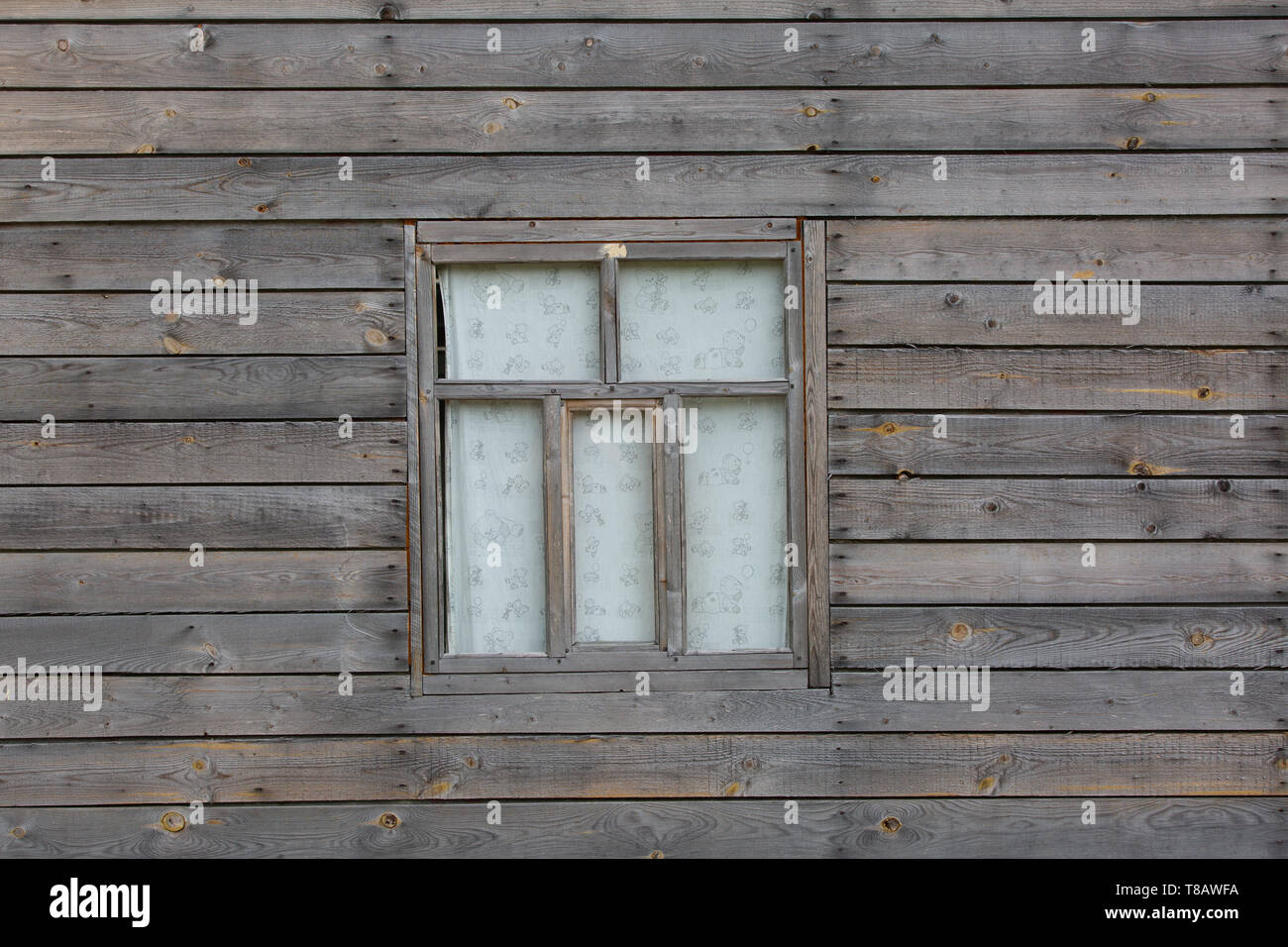 Fragment of one of walls of old village building with window Stock ...