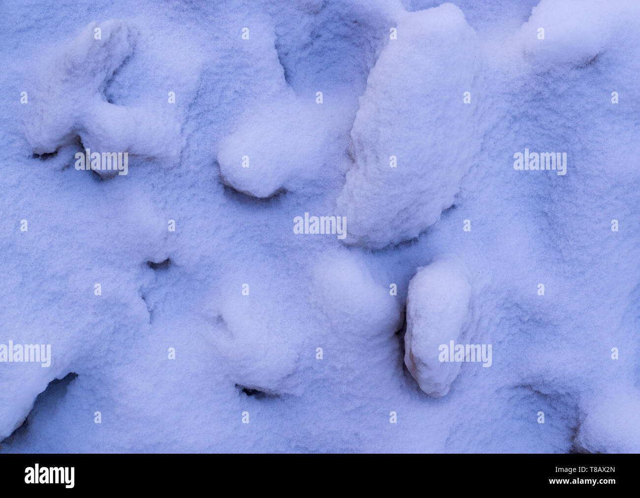 pile of melting ice blocks cowered with snow. seasonal, background ...