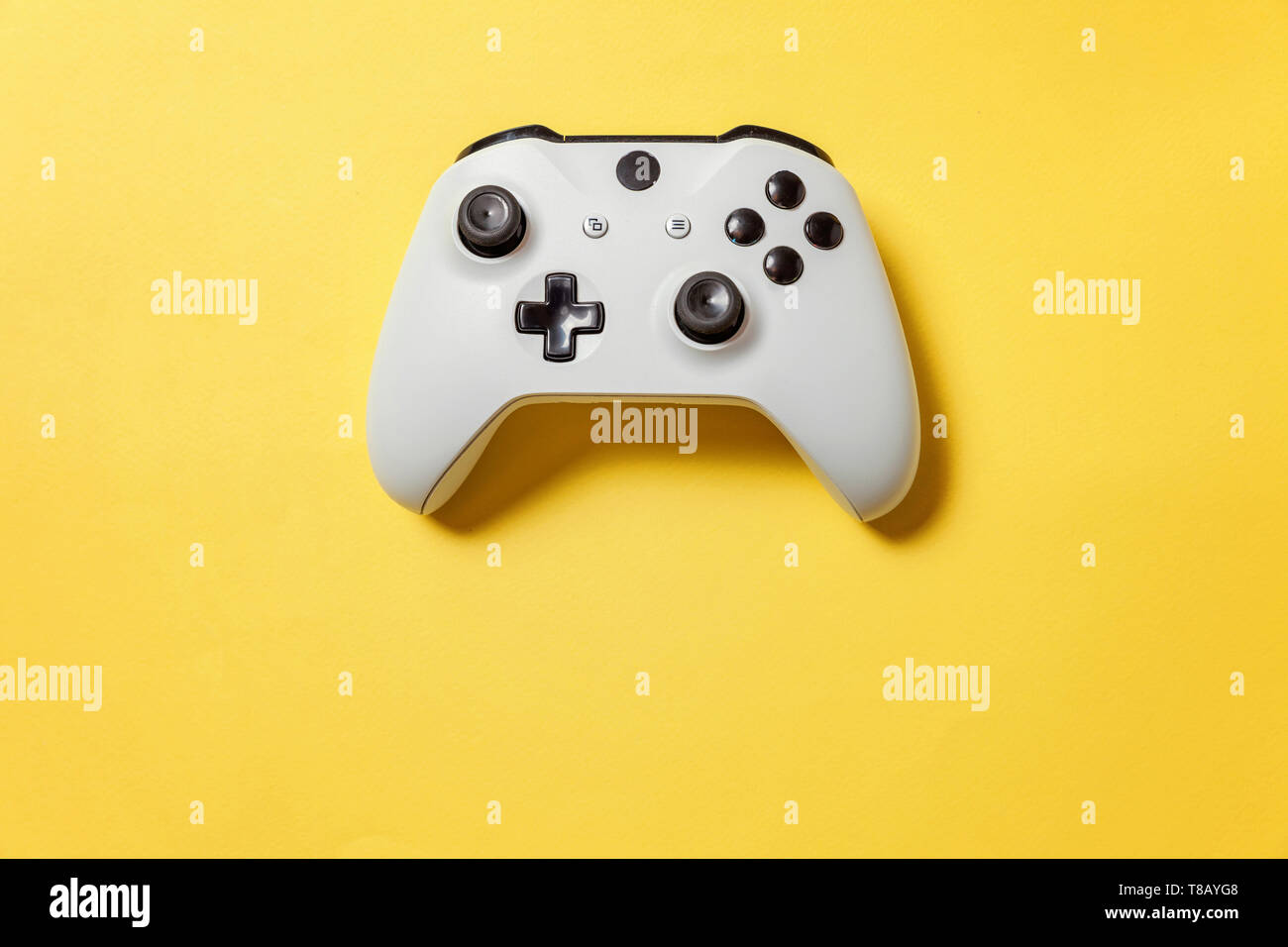 White Joystick Gamepad Game Console On Yellow Colourful Trendy Modern