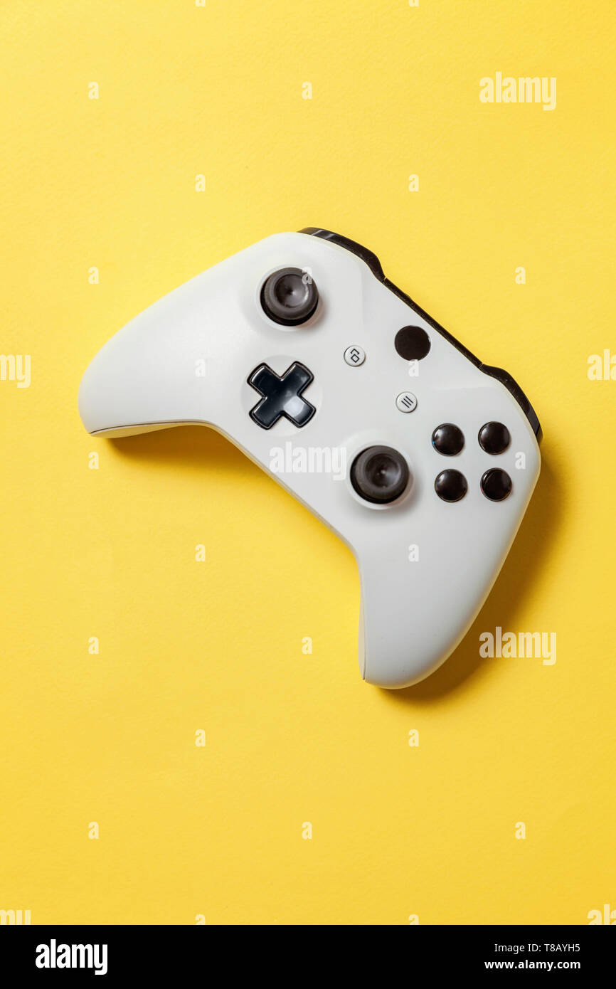 White Joystick Gamepad Game Console On Yellow Colourful Trendy Modern