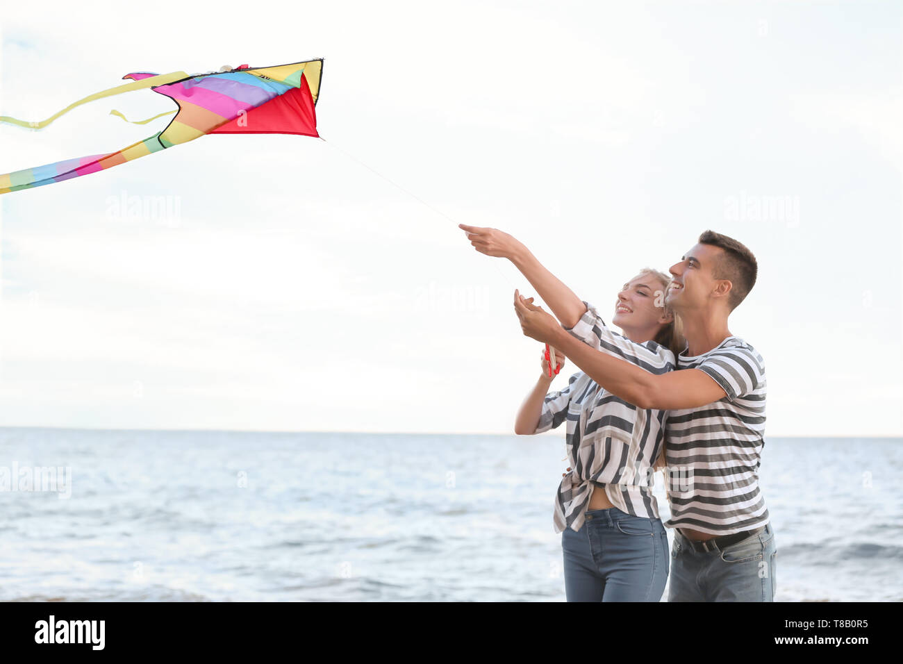 Couples Flying Kites
