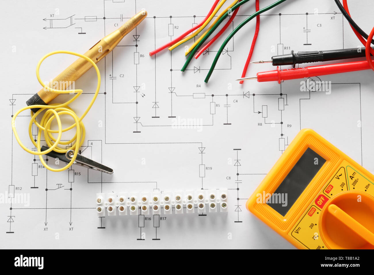 Different electrician's supplies on electrical scheme Stock Photo - Alamy