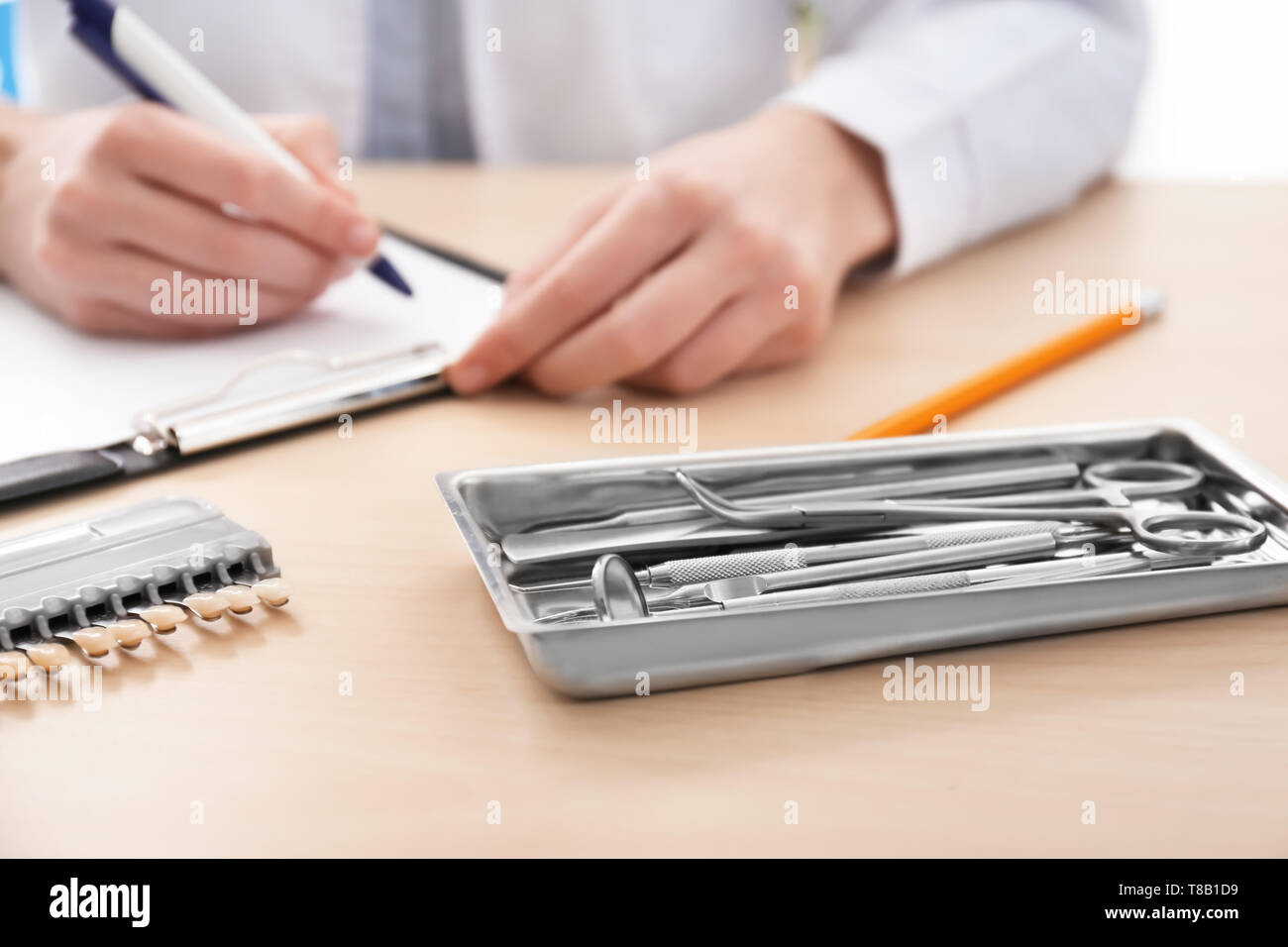 Set of professional dental tools on table in dentist's office Stock ...