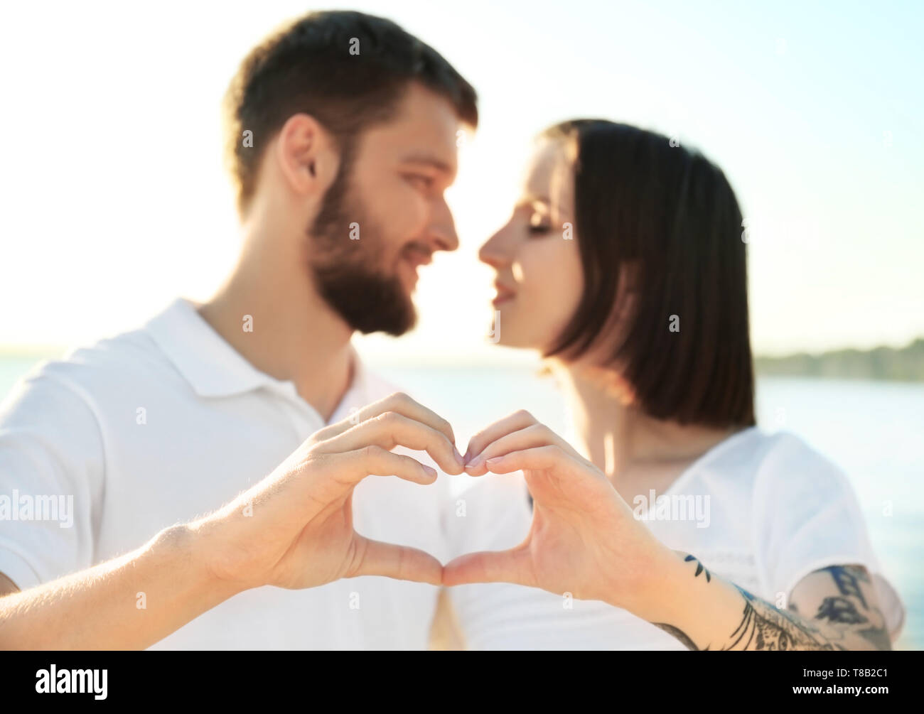 Happy lovely couple making hi-res stock photography and images - Alamy