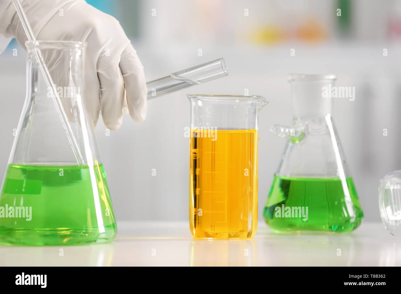 Scientist working with samples in laboratory Stock Photo - Alamy