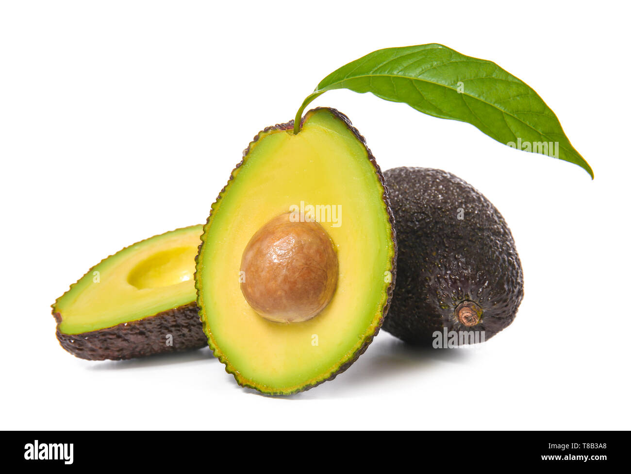 Ripe fresh avocados on white background Stock Photo - Alamy