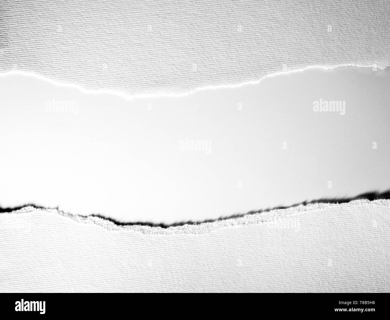 Space between white paper torn apart Stock Photo - Alamy