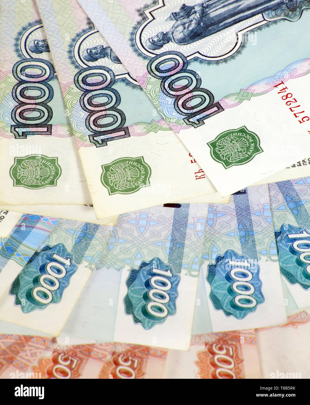 stack of bond 5000 and 1000 Stock Photo - Alamy