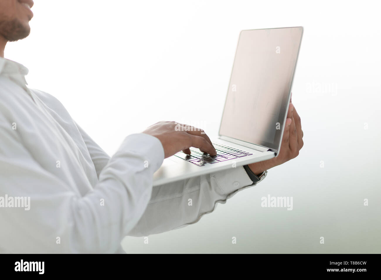 close up. businessman looking at laptop screen. people and technology ...