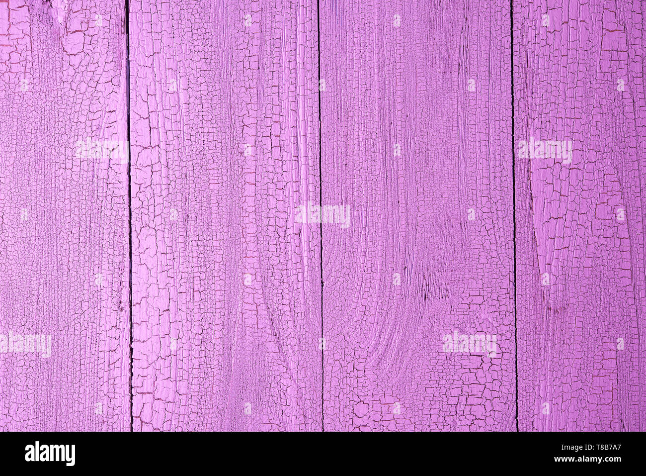 Close-up of old natural wooden planks painted in pink color with ...