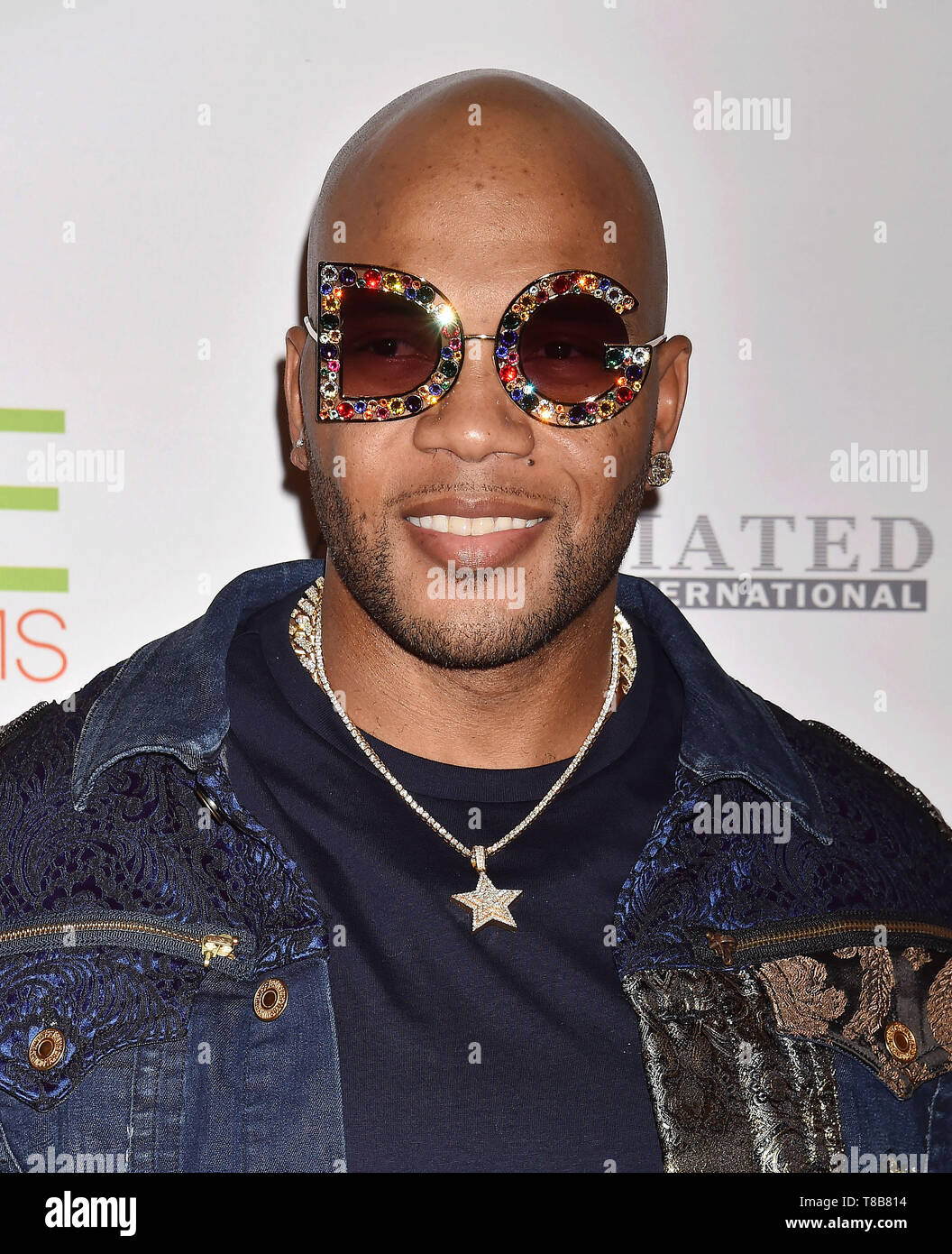 BEVERLY HILLS, CA - MAY 10: Flo Rida attends the 26th Annual Race to ...