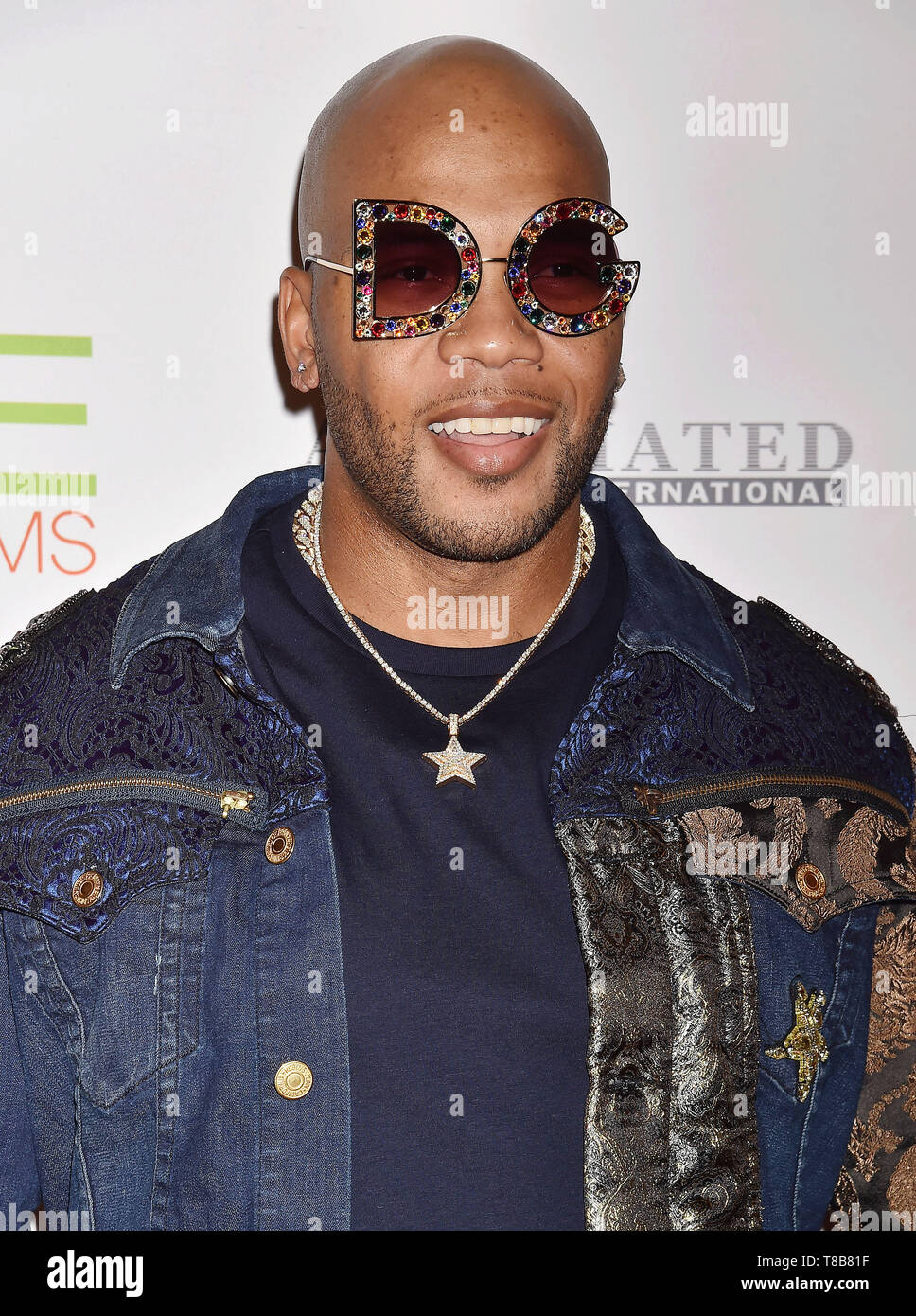 BEVERLY HILLS, CA - MAY 10: Flo Rida attends the 26th Annual Race to ...