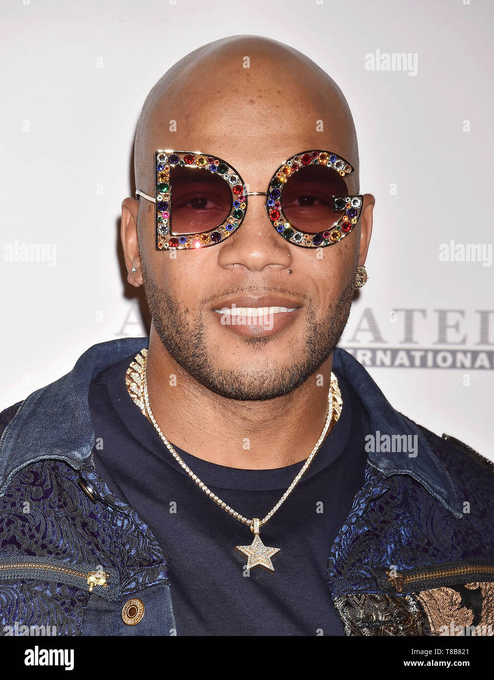 BEVERLY HILLS, CA - MAY 10: Flo Rida attends the 26th Annual Race to ...