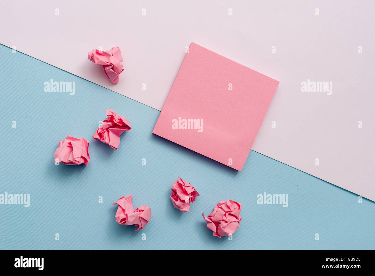 Note papers and stationary placed sideways on top of softhued backdrop ...