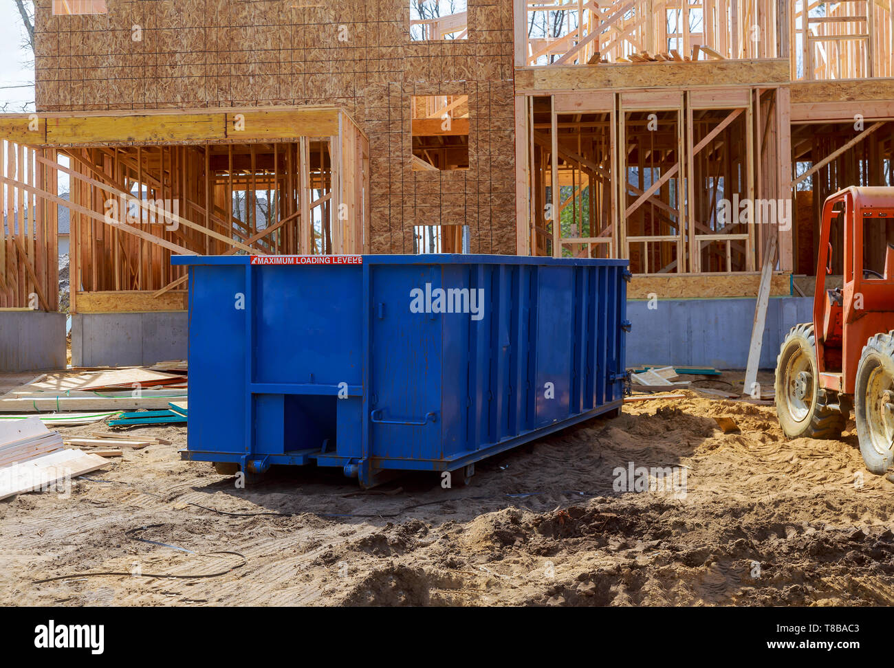 Old and used construction material in the new building construction ...