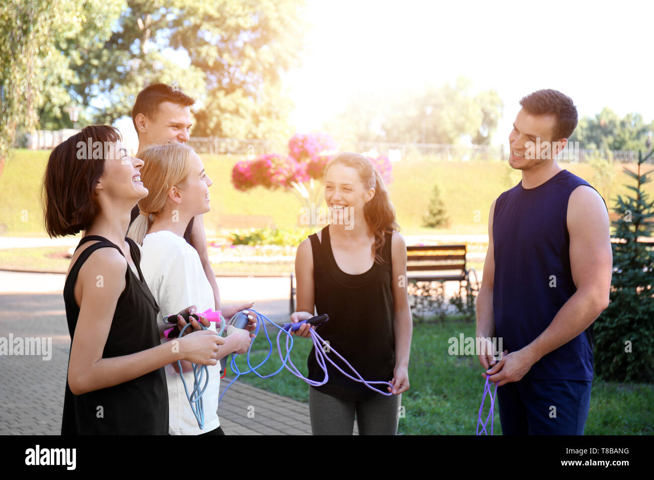 Group of young sporty people with jumping ropes outdoors Stock Photo ...