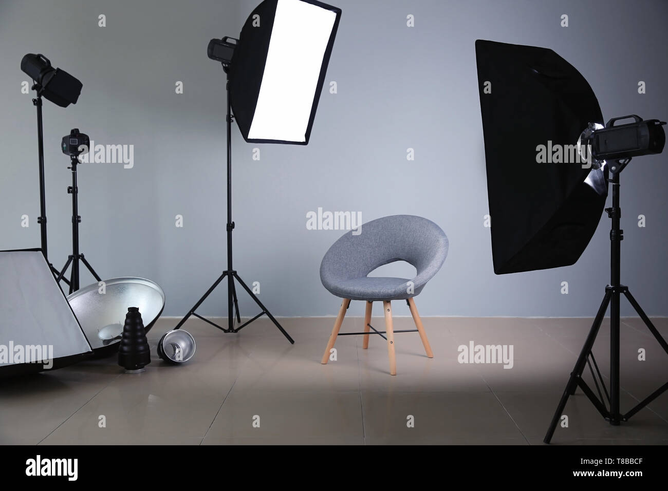Modern chair in photo studio with professional equipment Stock Photo ...